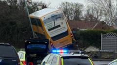 Cheltenham road closed after double-decker A46 bus crash - BBC News