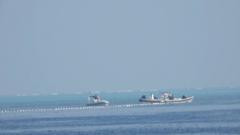 South China Sea: Philippines removes Chinese barrier in contested area ...