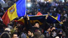 Romania protesters not backing down after decree repeal - BBC News