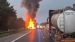 Major incident declared on M5 after car transporter fire - BBC News