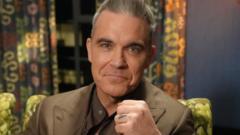 Robbie Williams explains why he's a monkey in his new movie - BBC News