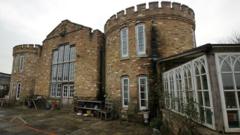 Demolition of Surrey 'hidden castle' almost complete - BBC News