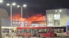 What caused the Luton Airport fire and what happens next? - BBC News