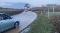 Somerset roads and and businesses impacted by heavy rain - BBC News