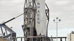 SpaceX rocket in historic upright landing - BBC News
