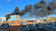 Reading fire: Crane operator rescues worker next to burning high-rise ...