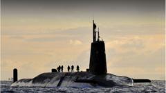 Nuclear submarine HMS Vanguard leaves Devonport after refit delay - BBC ...