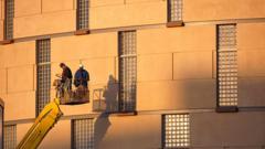 Dangerous cladding: 'Fire patrols at our flats cost us £500,000' - BBC News