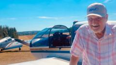 Ex-RAF pilot flies Spitfire for first time aged 102 - BBC News