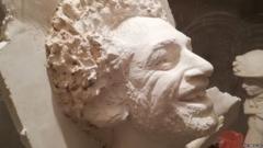 Mo Salah: Unusual sculpture of Liverpool star unveiled in Egypt - BBC News