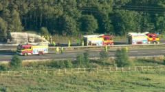 Propane tanker fire shuts M56 motorway near Chester - BBC News