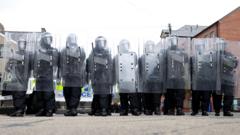 Belfast violence brings together unlikely protest alliance - BBC News