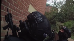 Four arrests in raid on Greater Manchester's 'most harmful gang' - BBC News