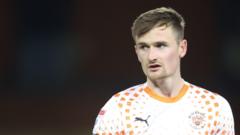 Callum Connolly: Ex-Blackpool man agrees two-year deal Stockport - BBC ...