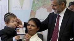 Israel rewards nanny who saved boy in Mumbai attacks - BBC News