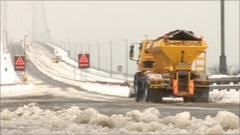 Forth Road Bridge reopens after 'unprecedented' snow - BBC News