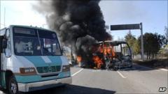Mexico police break Morelia drug gang blockade - BBC News