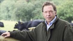 Devon farmer refuses to allow snow to stop deliveries - BBC News