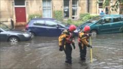 Homes and cars flooded in Edinburgh downpour - BBC News