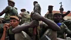 West African Ecowas leaders impose Mali sanctions - BBC News