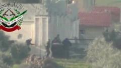 Rebels 'seize most of Syria police academy' - BBC News