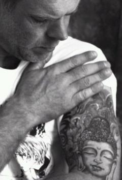 Briton denies Buddha tattoo was 'disrespectful' - BBC News