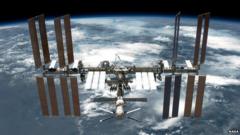 Nasa orders urgent spacewalks for space station repairs - BBC News