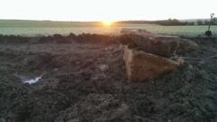 Wiltshire's 'Neolithic' long barrow burial chamber opens - BBC News