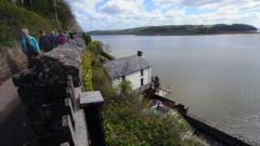 Dylan Thomas letters return to Laugharne boathouse - BBC News