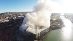 Newhaven rubbish fire burns for fourth day - BBC News
