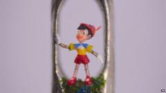 Willard Wigan's microscopic artworks exhibited in Birmingham - BBC News