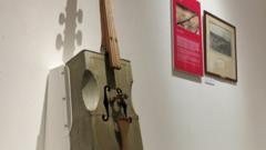 Trench cello from WW1 played for 'first time' - BBC News