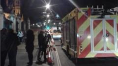 Arrest after man spends night on roof of Parliament - BBC News