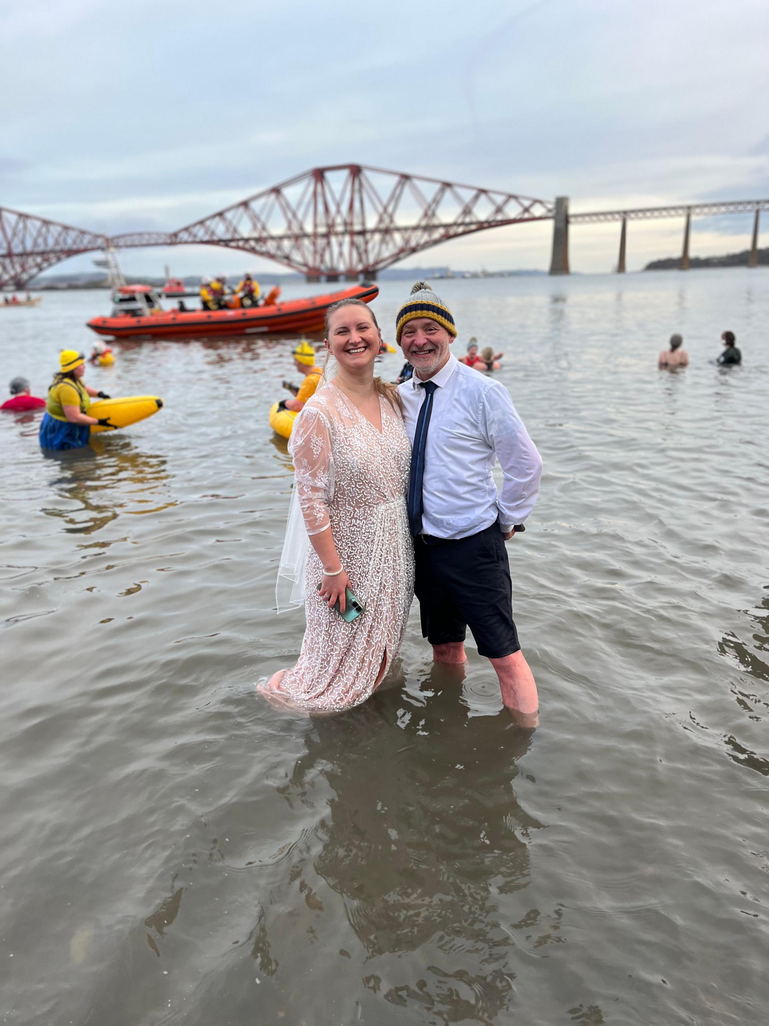 Hundreds brave freezing Firth of Forth in 2026 Loony Dook plunge - BBC News