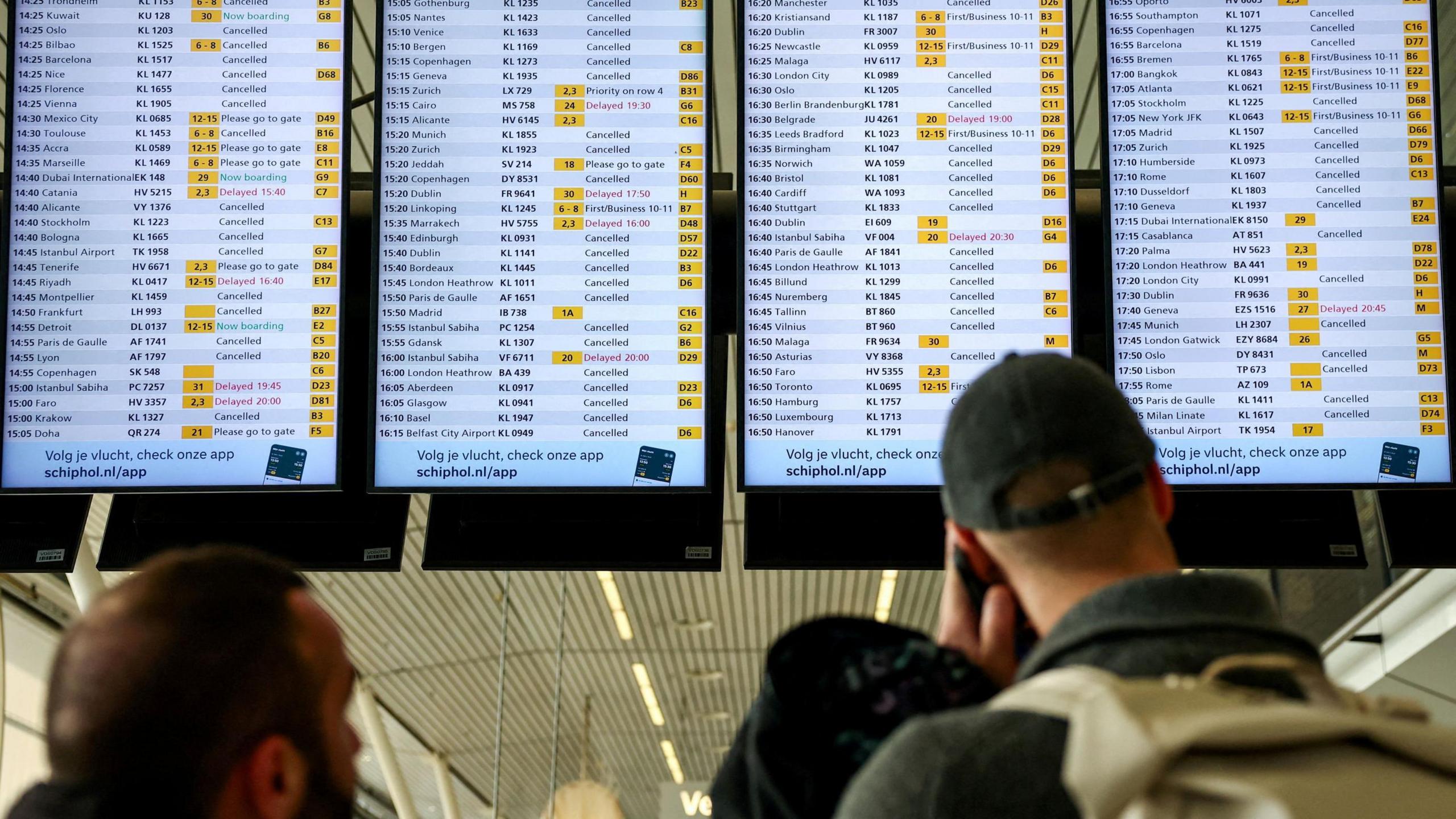 Six dead and hundreds of flights cancelled as snow causes chaos across ...