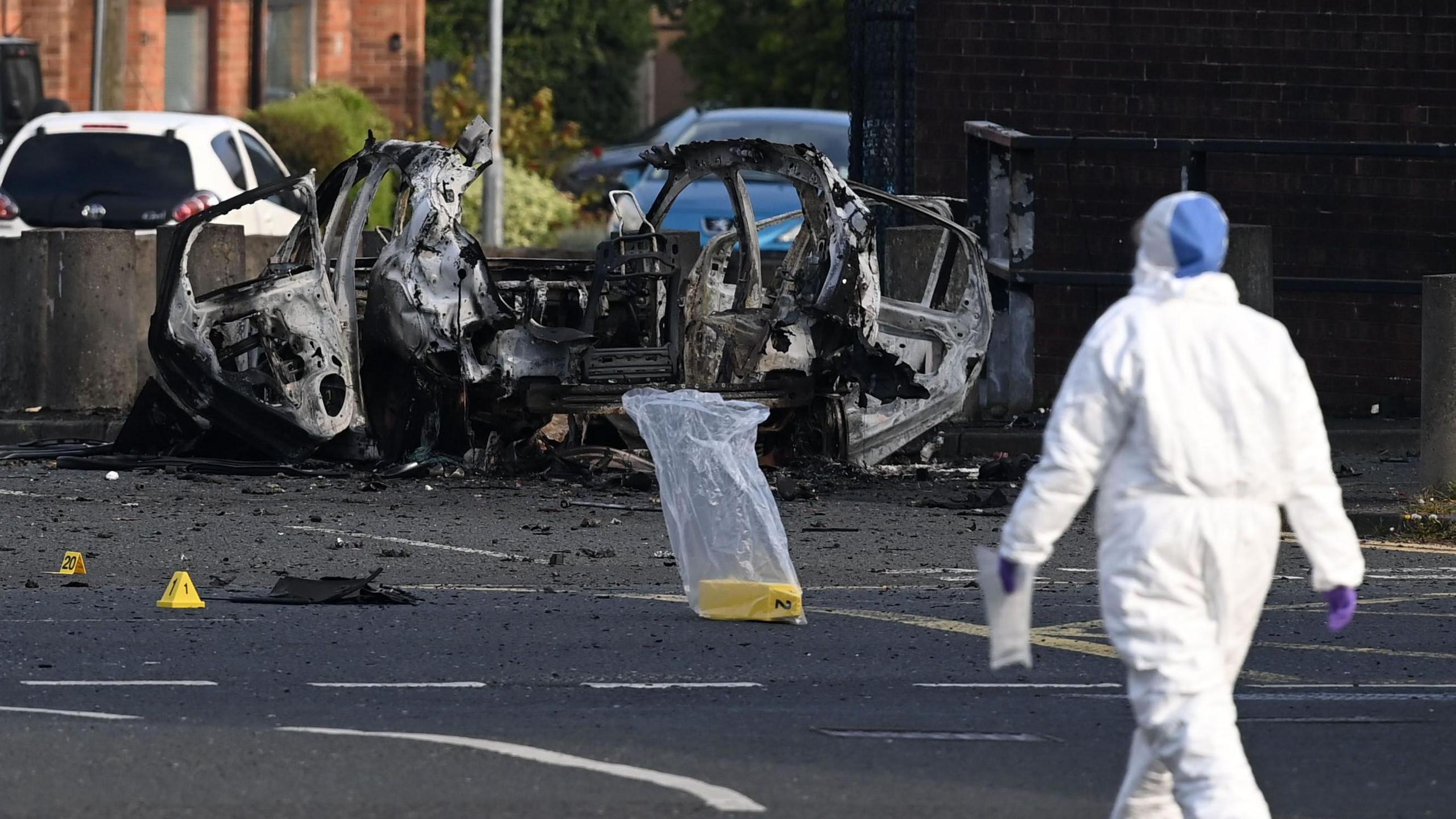 Dunmurry car bomb: Man appears in court over attempted murder - BBC News
