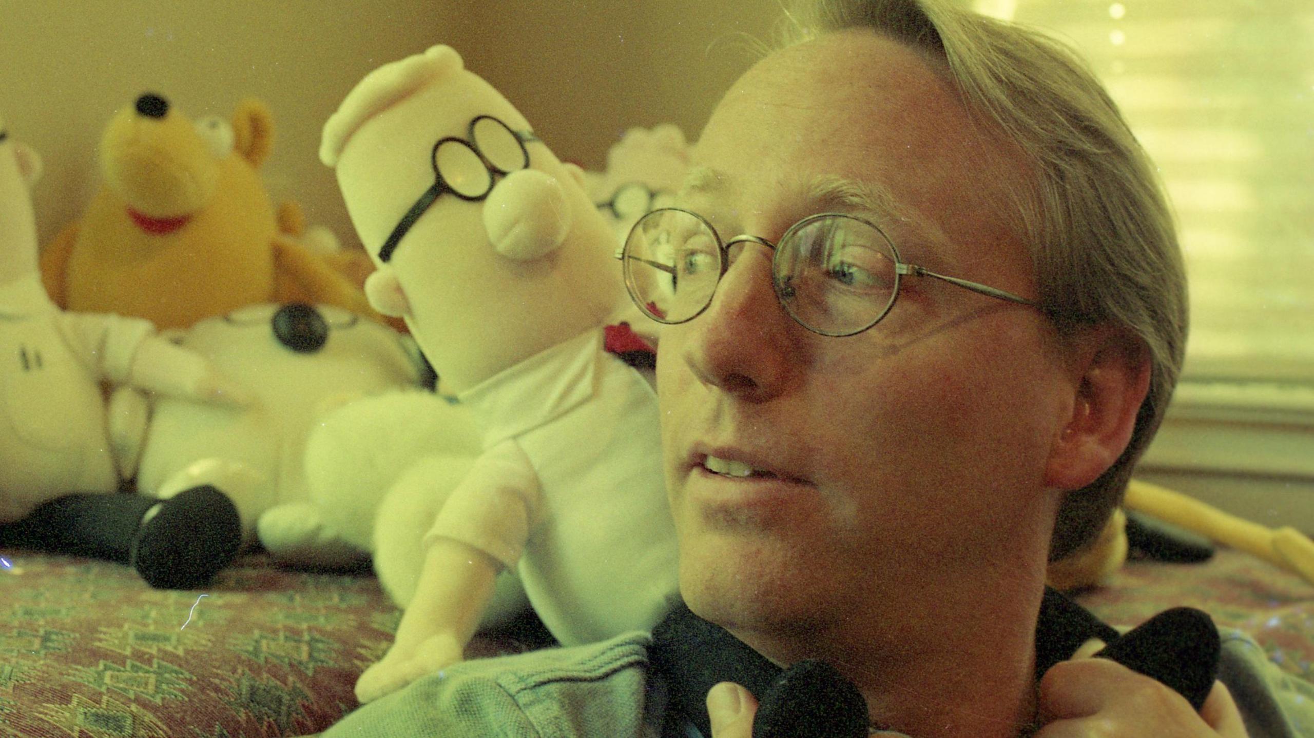 Controversial Dilbert cartoonist Scott Adams dies aged 68 - BBC News