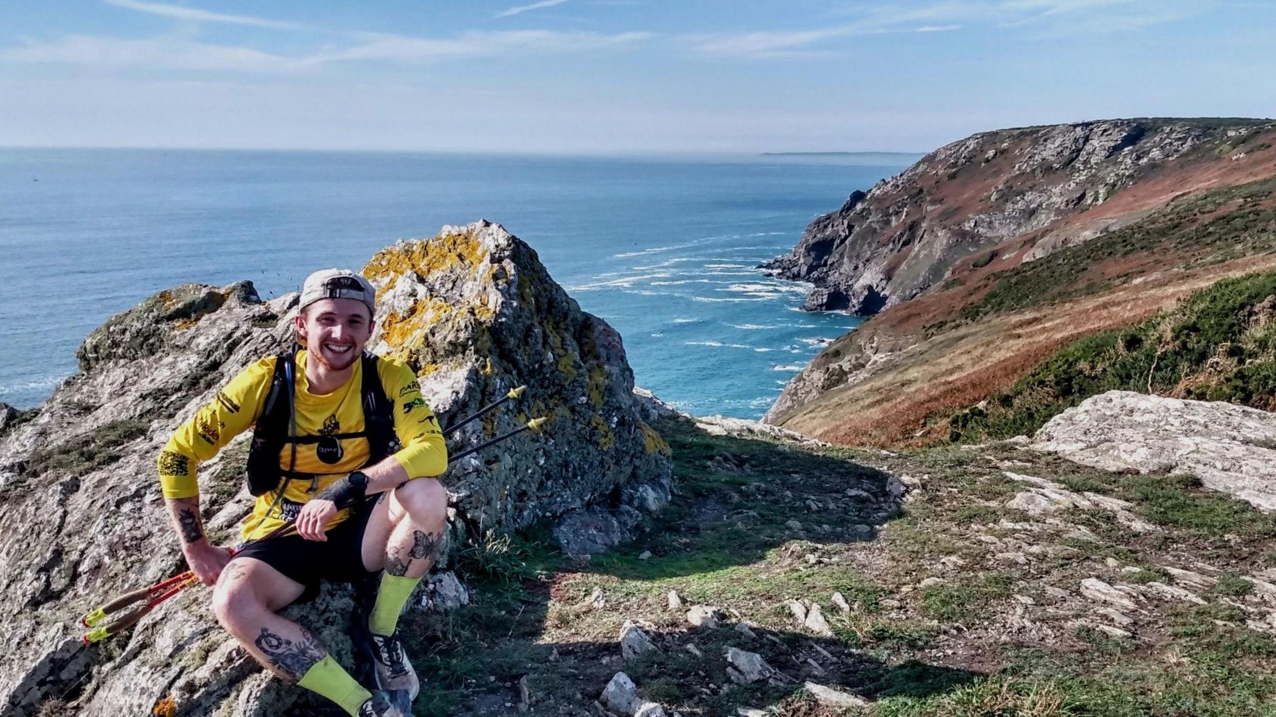 Cheddar: Marathon runner raises £15k on South West Coast Path - BBC News