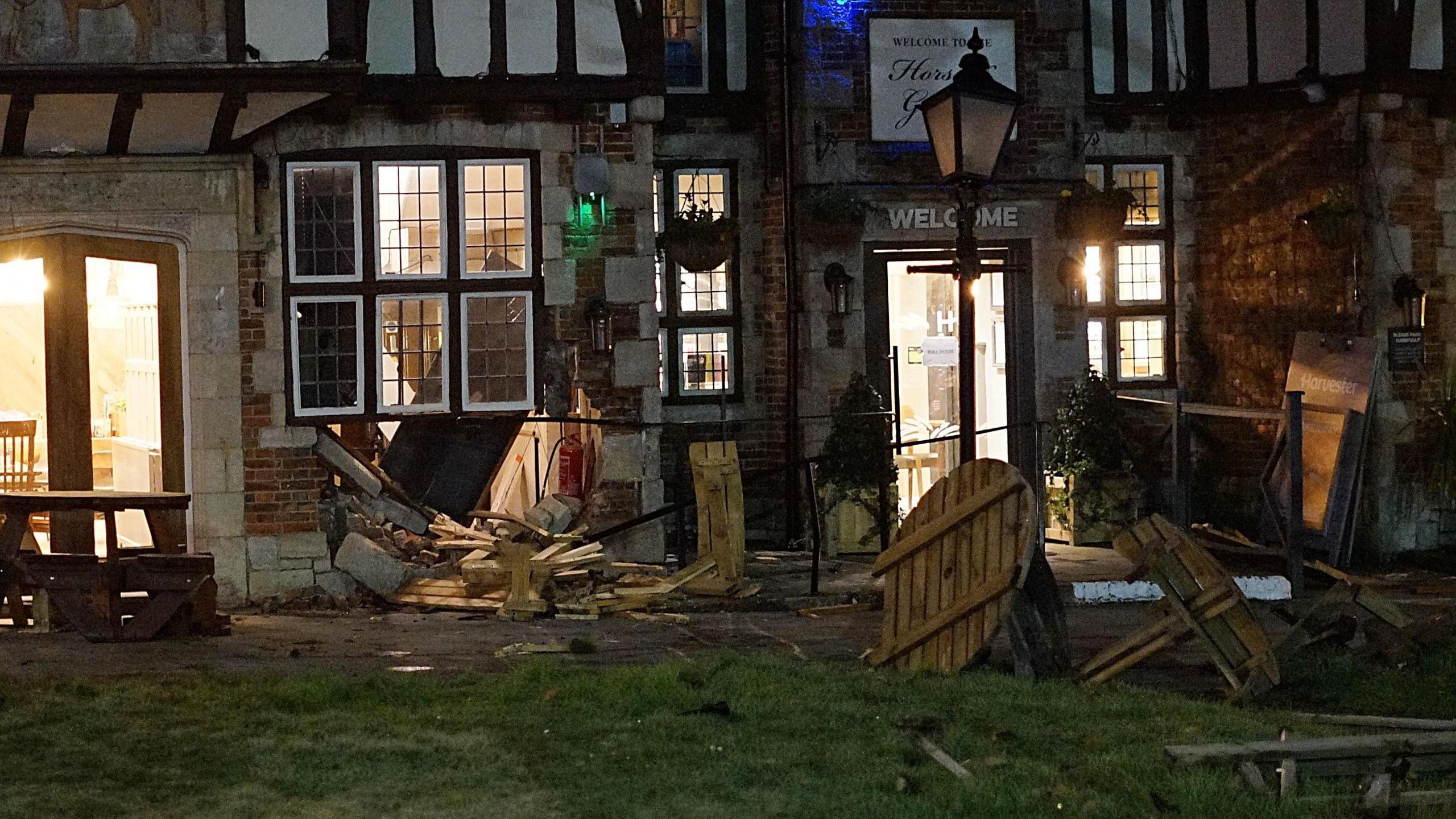 Man arrested after van crashes into pub in Polegate - BBC News