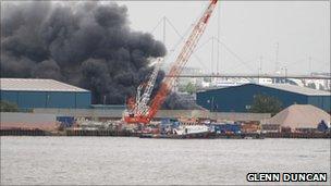 DLR suspended by Canning Town recycling plant fire - BBC News