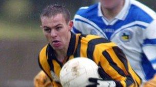 Priest pays tribute to Crossmaglen murder victim James Hughes - BBC News