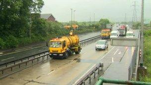 Long delays on Sydenham bypass due to flooding - BBC News