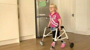 Molly Grove, 3, flies to US for operation to help her walk - BBC News