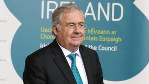 Anti-austerity protesters chant insults at Irish minister Pat Rabbitte ...