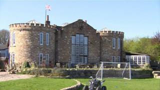 Demolition of Surrey 'hidden castle' almost complete - BBC News