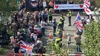 Council leader urges end to asylum hotel protests in Exeter - BBC News