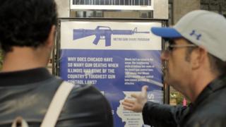 Activists mock US gun culture with Chicago 'gun-sharing' dock - BBC News