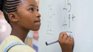 Girls in England lag behind boys in maths and science study - BBC News