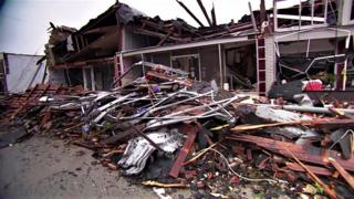 Dozens rescued as tornado collapses Michigan FedEx depot - BBC News