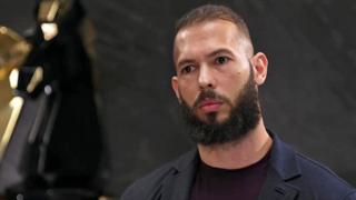 Andrew Tate charged with rape and human trafficking - BBC News